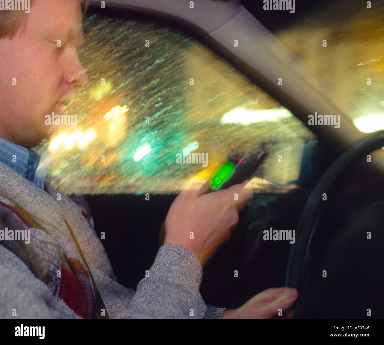 mobile telephoning by driving a car Stock Photo - Alamy