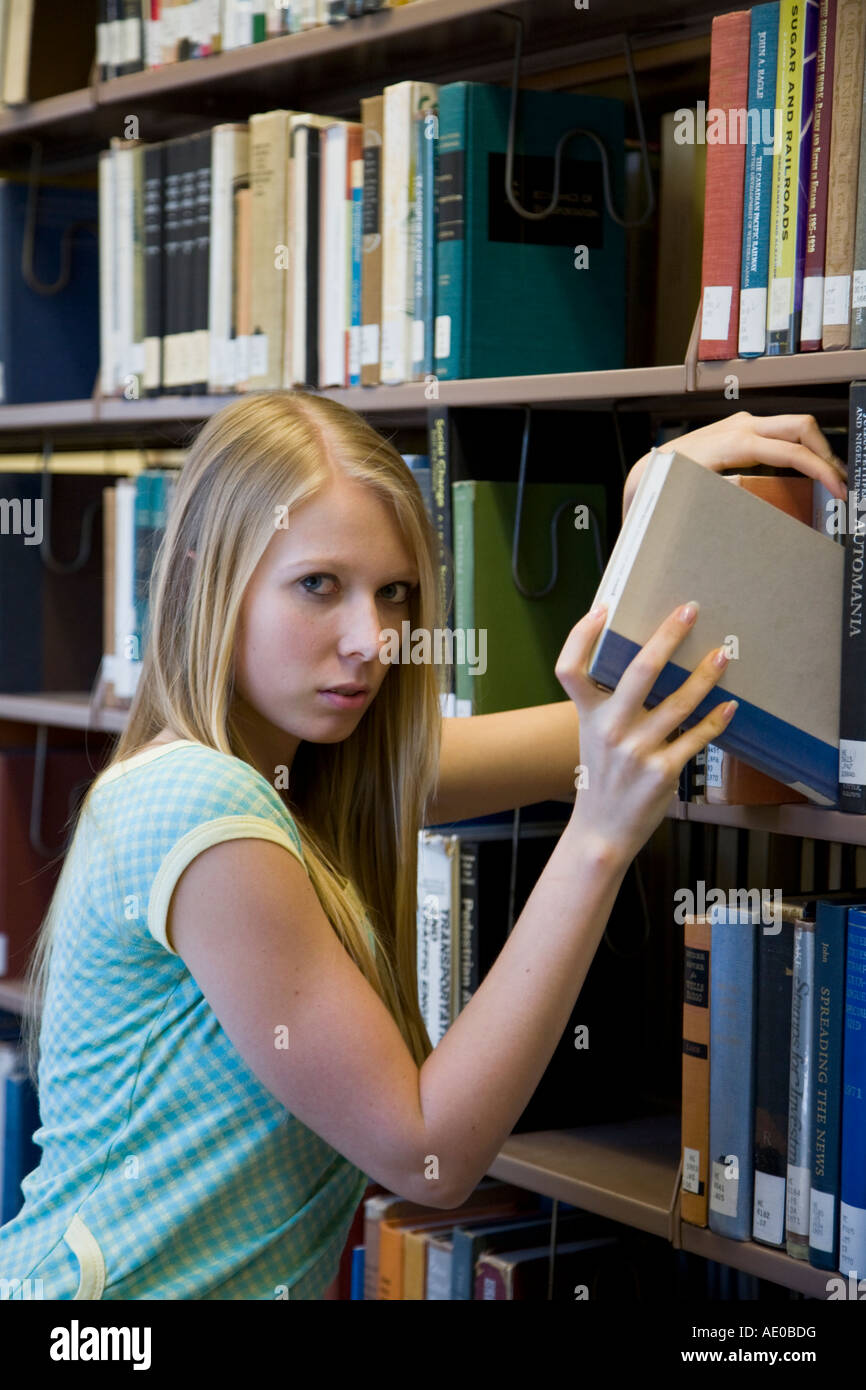 College Girl Studying in Library Stock Photo - Alamy