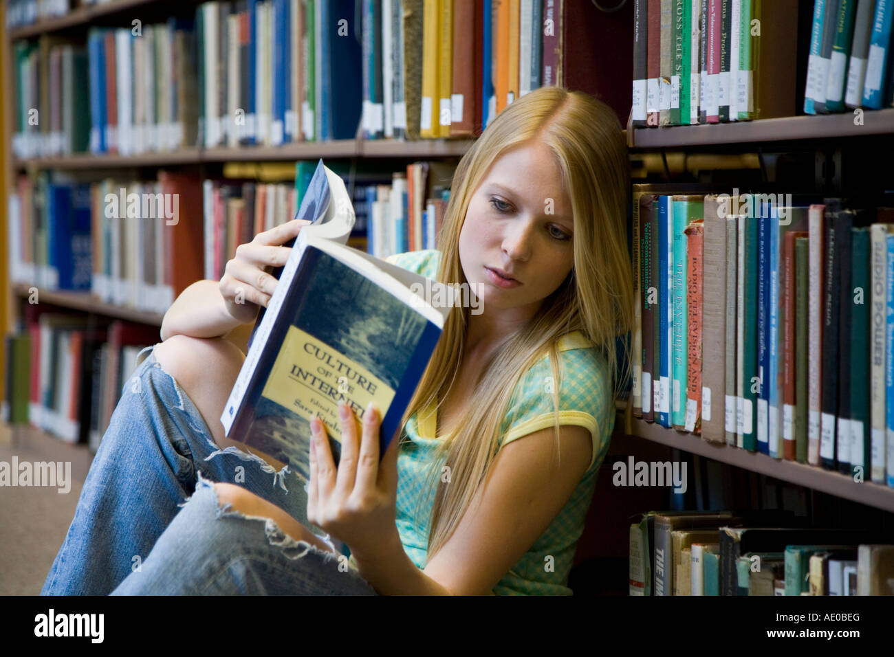 College Girl Studying in Library Stock Photo - Alamy