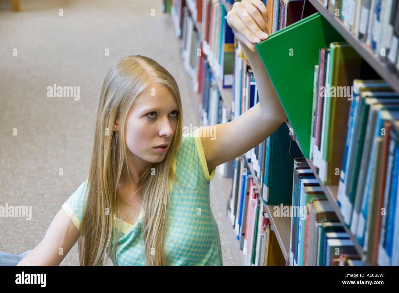 College Girl Studying in Library Stock Photo - Alamy