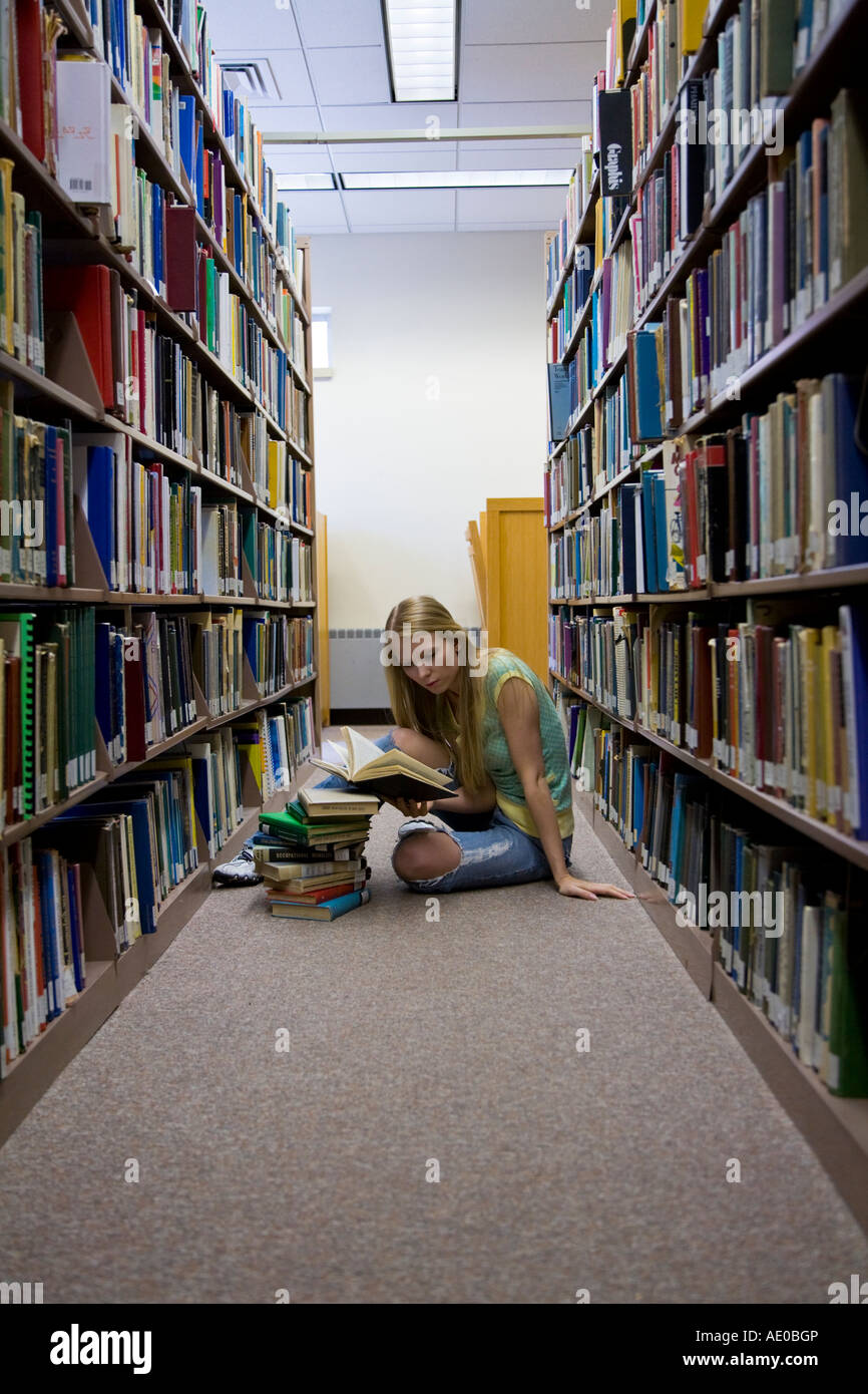 College Girl Studying in Library Stock Photo - Alamy