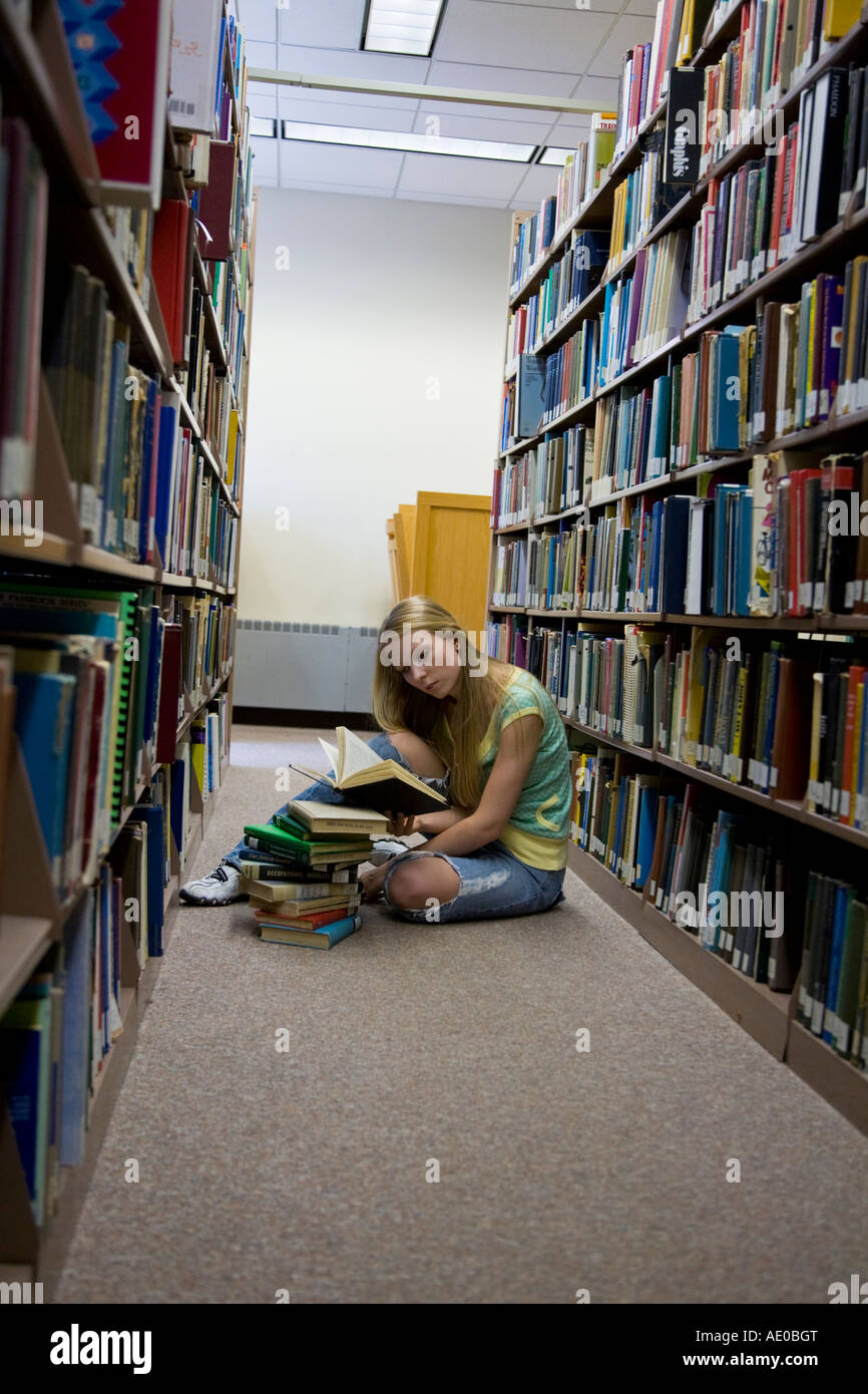 College Girl Studying in Library Stock Photo - Alamy