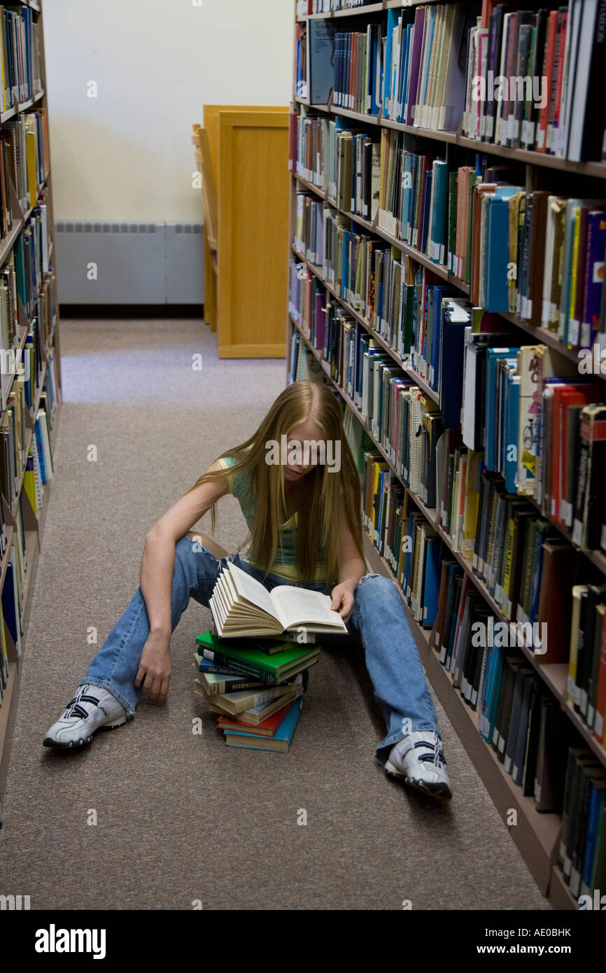 College Girl Studying in Library Stock Photo - Alamy