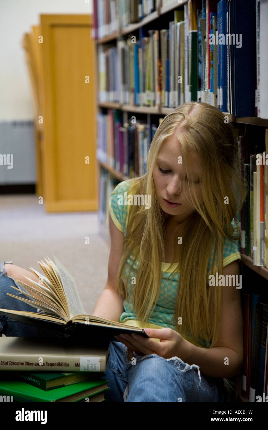 College Girl Studying in Library Stock Photo - Alamy