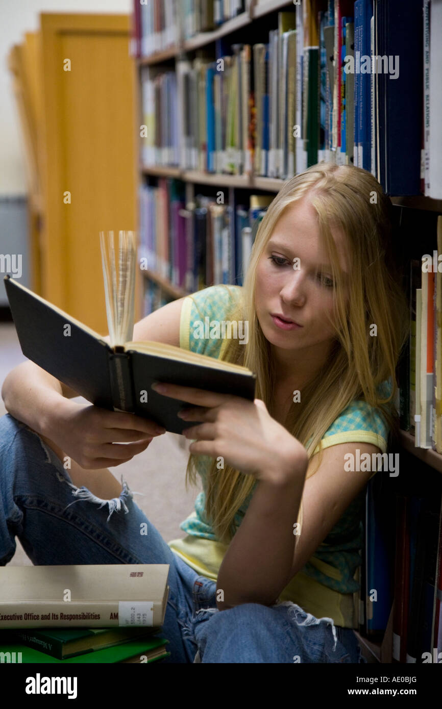 College Girl Studying in Library Stock Photo - Alamy