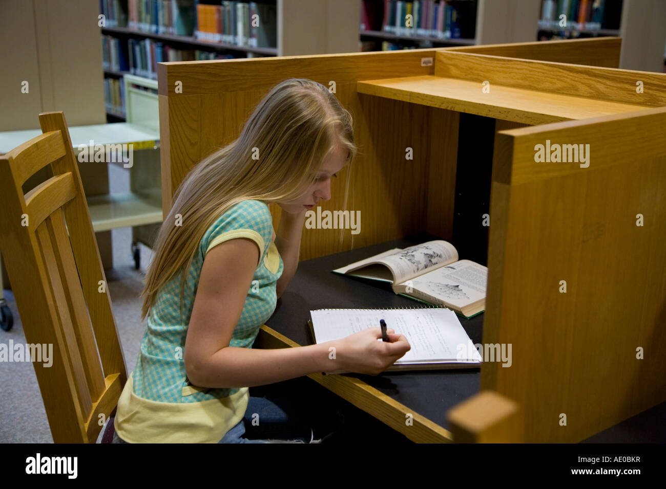 College Girl Studying in Library Stock Photo - Alamy