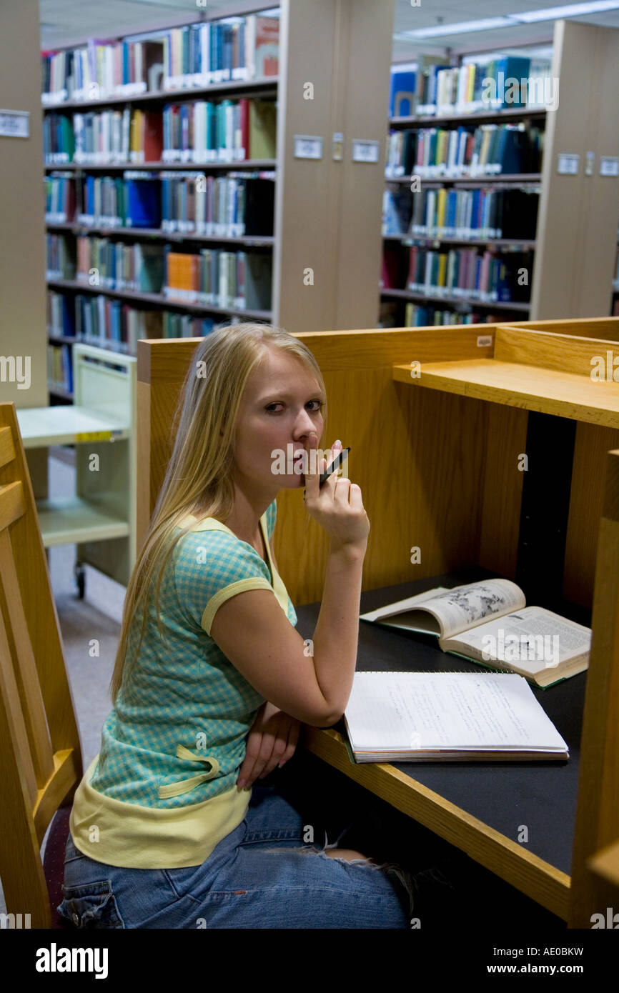 College Girl Studying in Library Stock Photo - Alamy