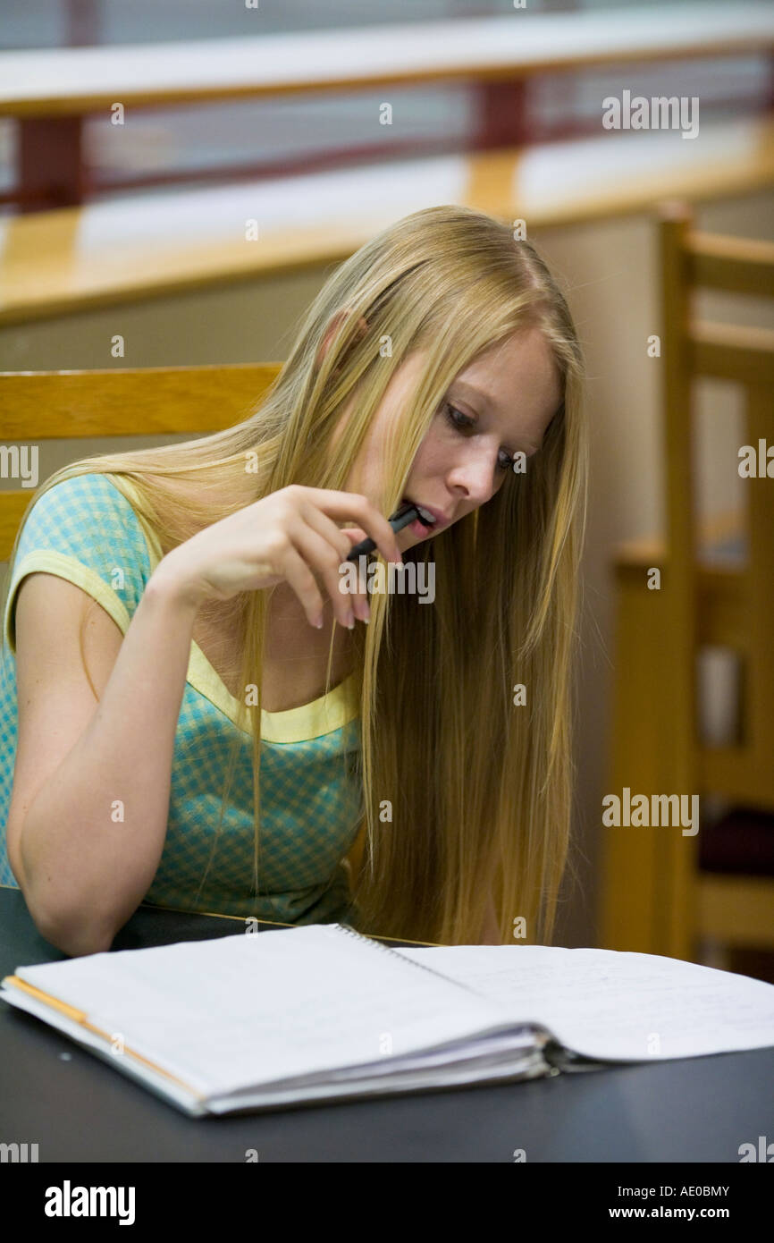 College Girl Studying in Library Stock Photo - Alamy