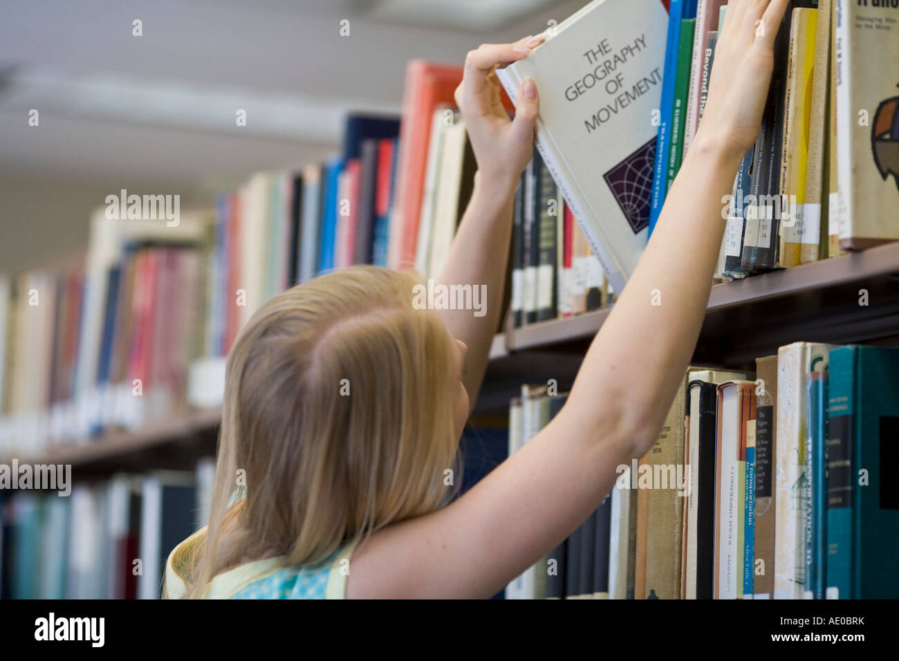 College Girl Studying in Library Stock Photo - Alamy