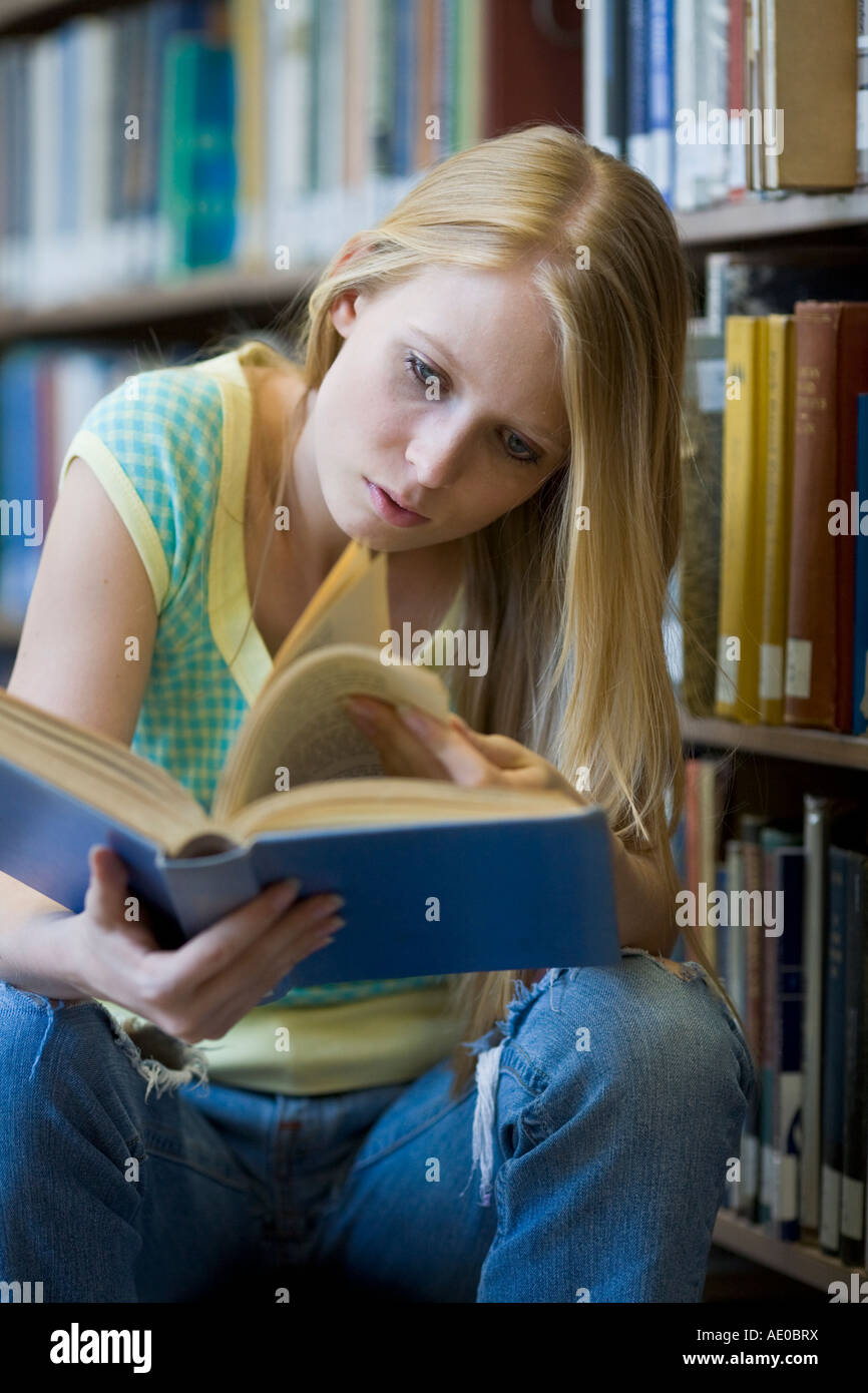 College Girl Studying in Library Stock Photo - Alamy