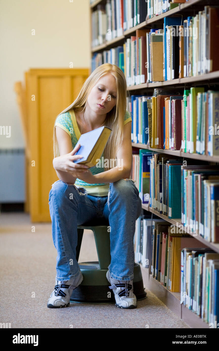 College Girl Studying in Library Stock Photo - Alamy