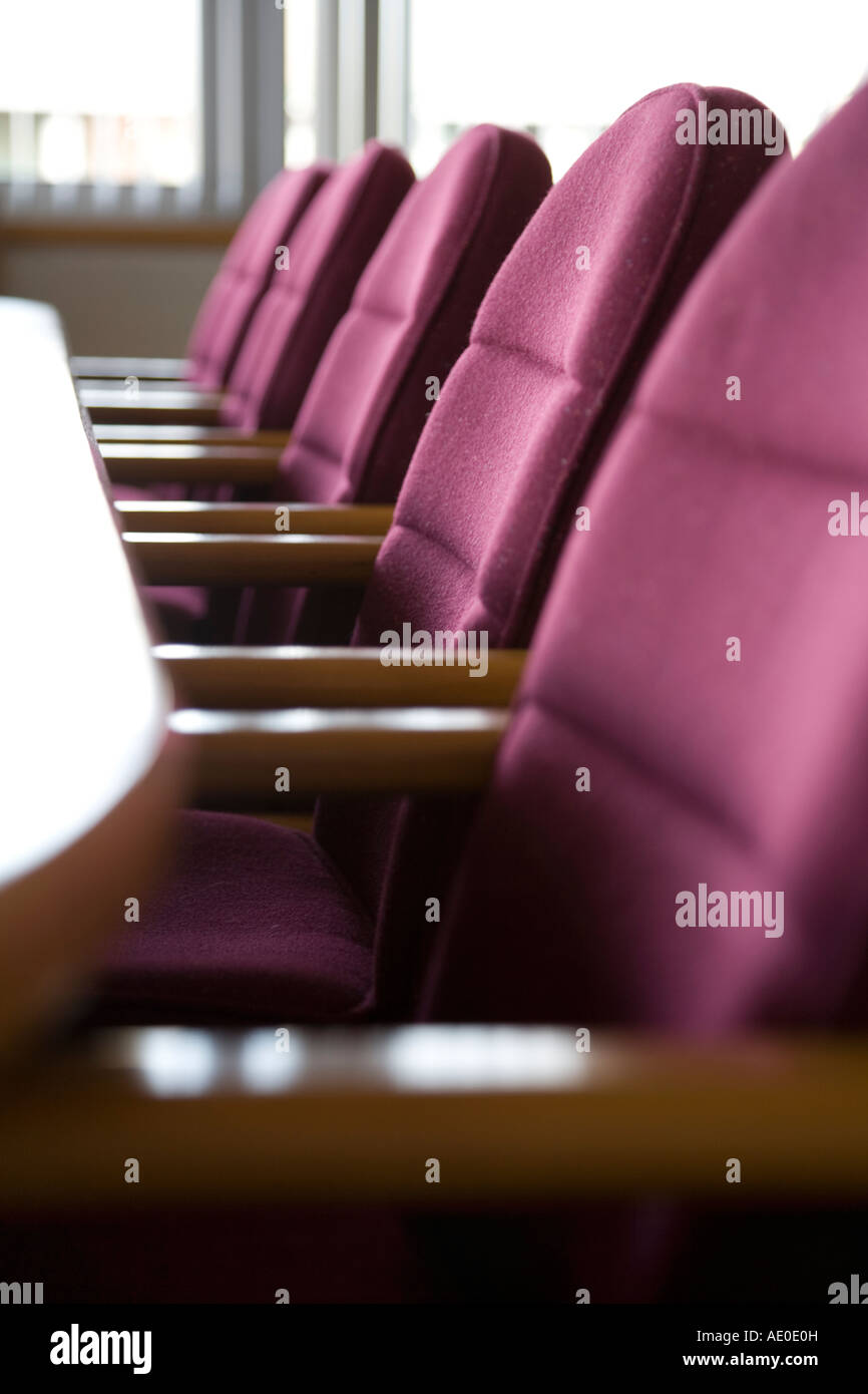 Boardroom table and chairs in a row Stock Photo - Alamy