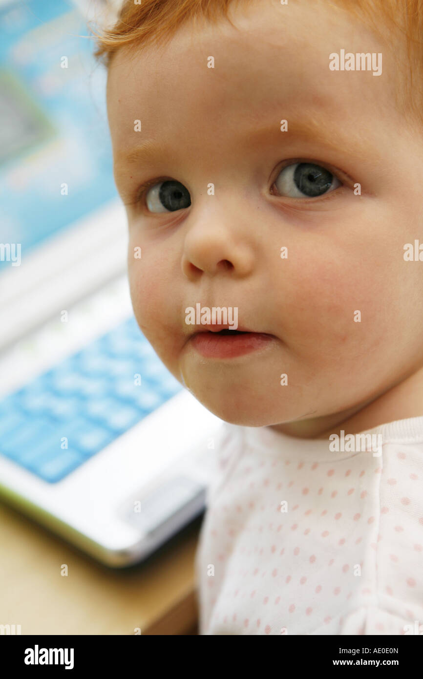 A baby toddler working on a laptop PC computer Stock Photo - Alamy