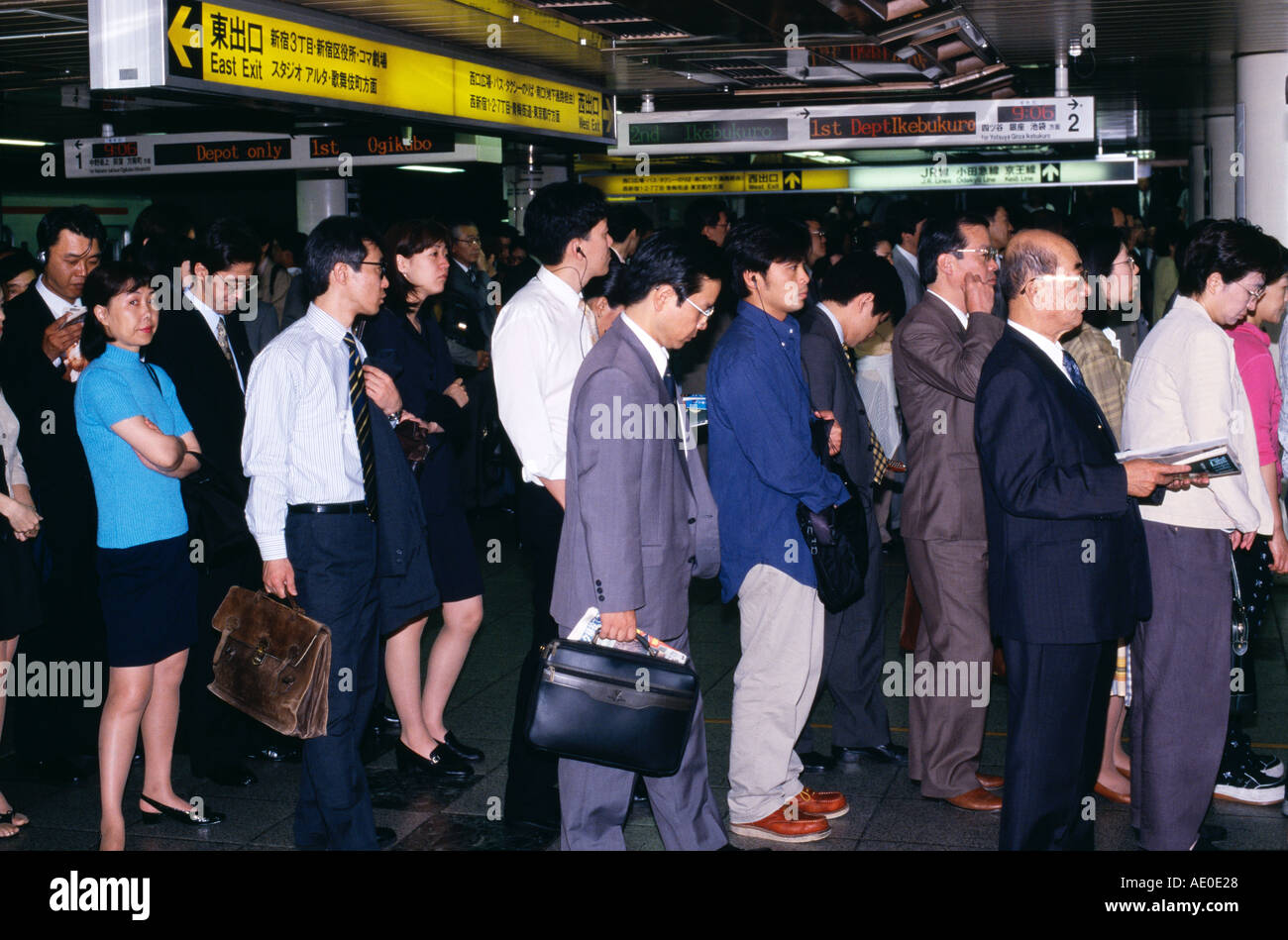 Queuing for train hi-res stock photography and images - Alamy