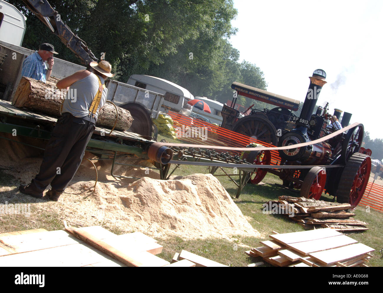 steam traction engine powers a large table circular saw Stock Photo - Alamy