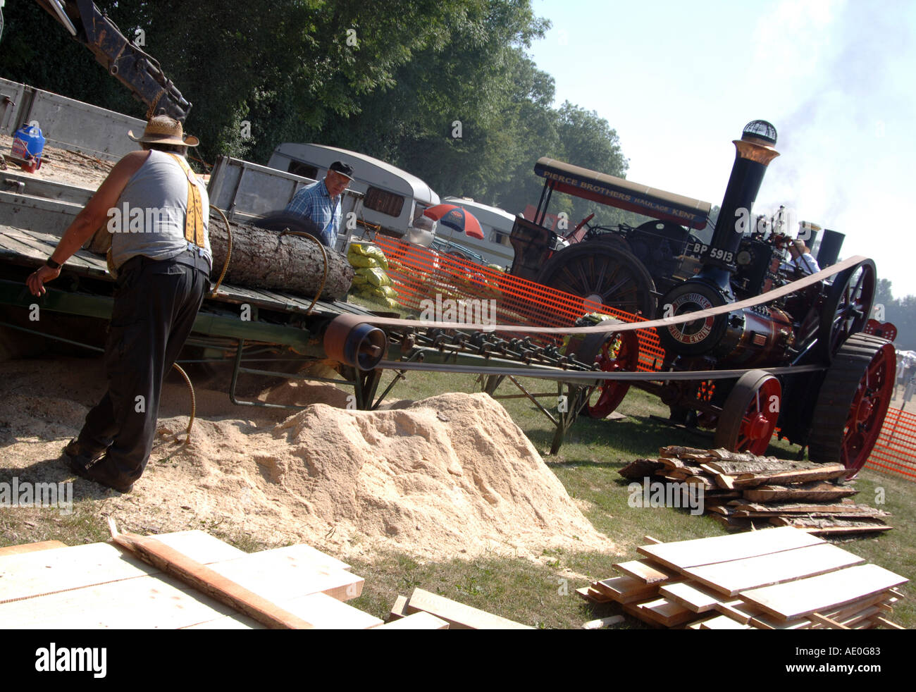 steam traction engine powers a large table circular saw Stock Photo - Alamy