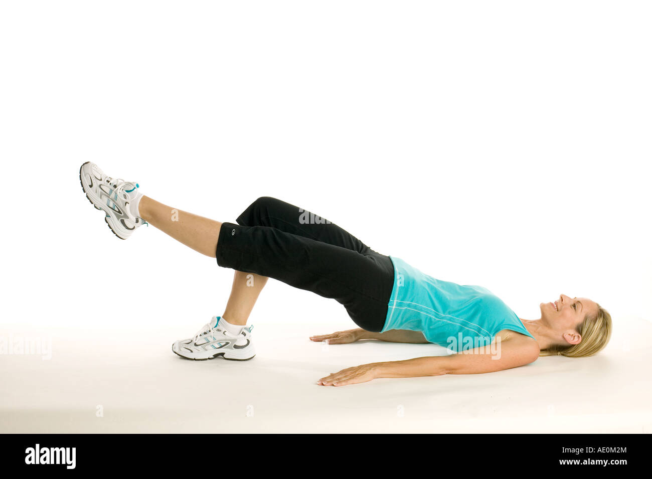 Debbie leg lift Stock Photo - Alamy