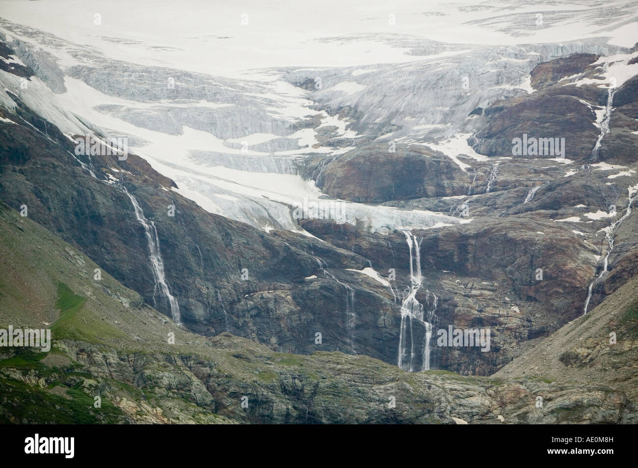 A rapidly receeding glacier above Alp Grum Switzerland below the ...