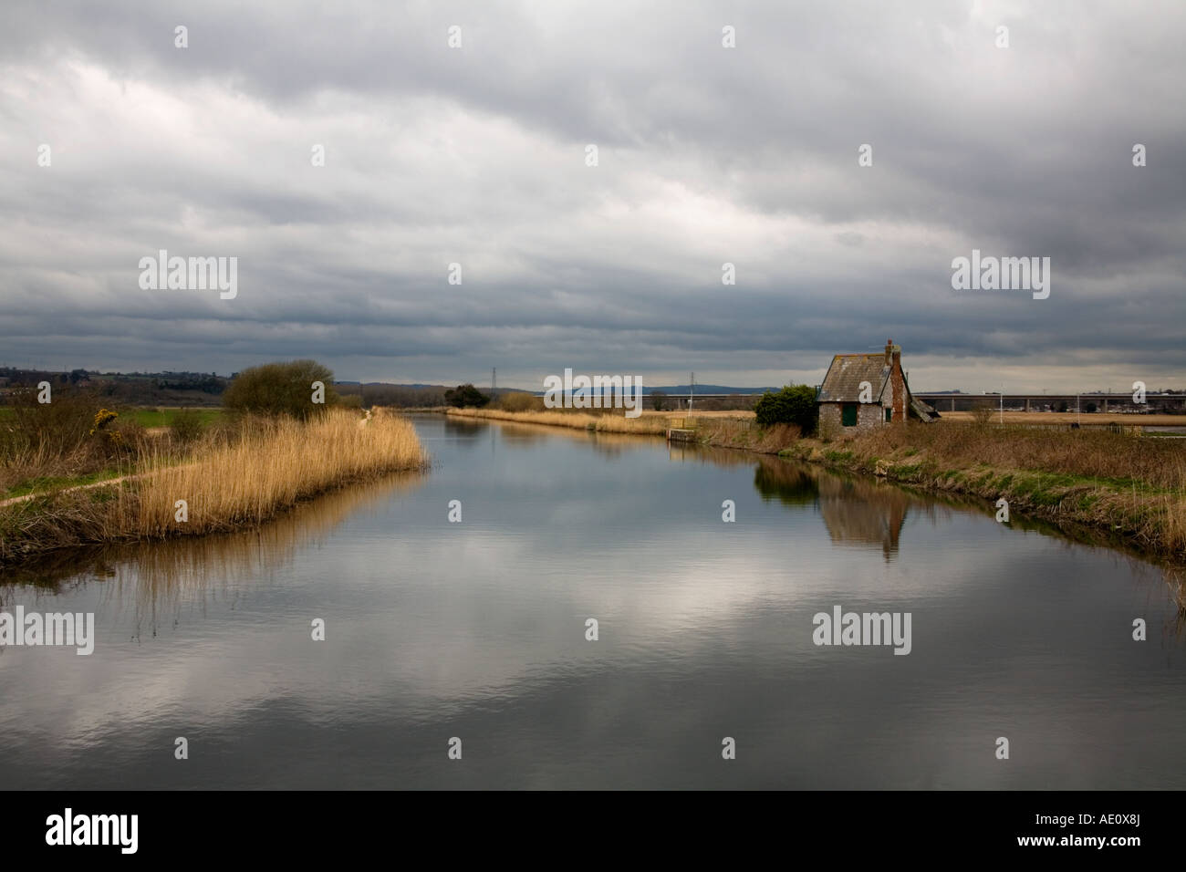 Exeter canal near Exeter Devon with the M5 motorway in the backgroud ...