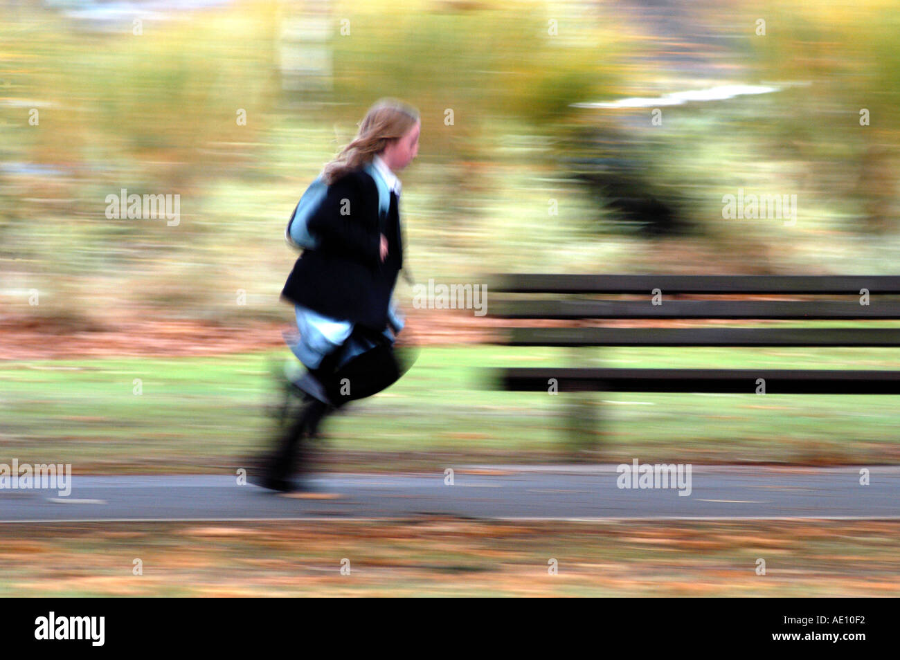 Running home from school hi-res stock photography and images - Alamy