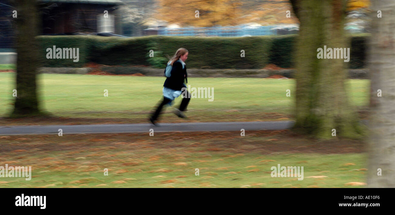 Running home from school Stock Photo - Alamy