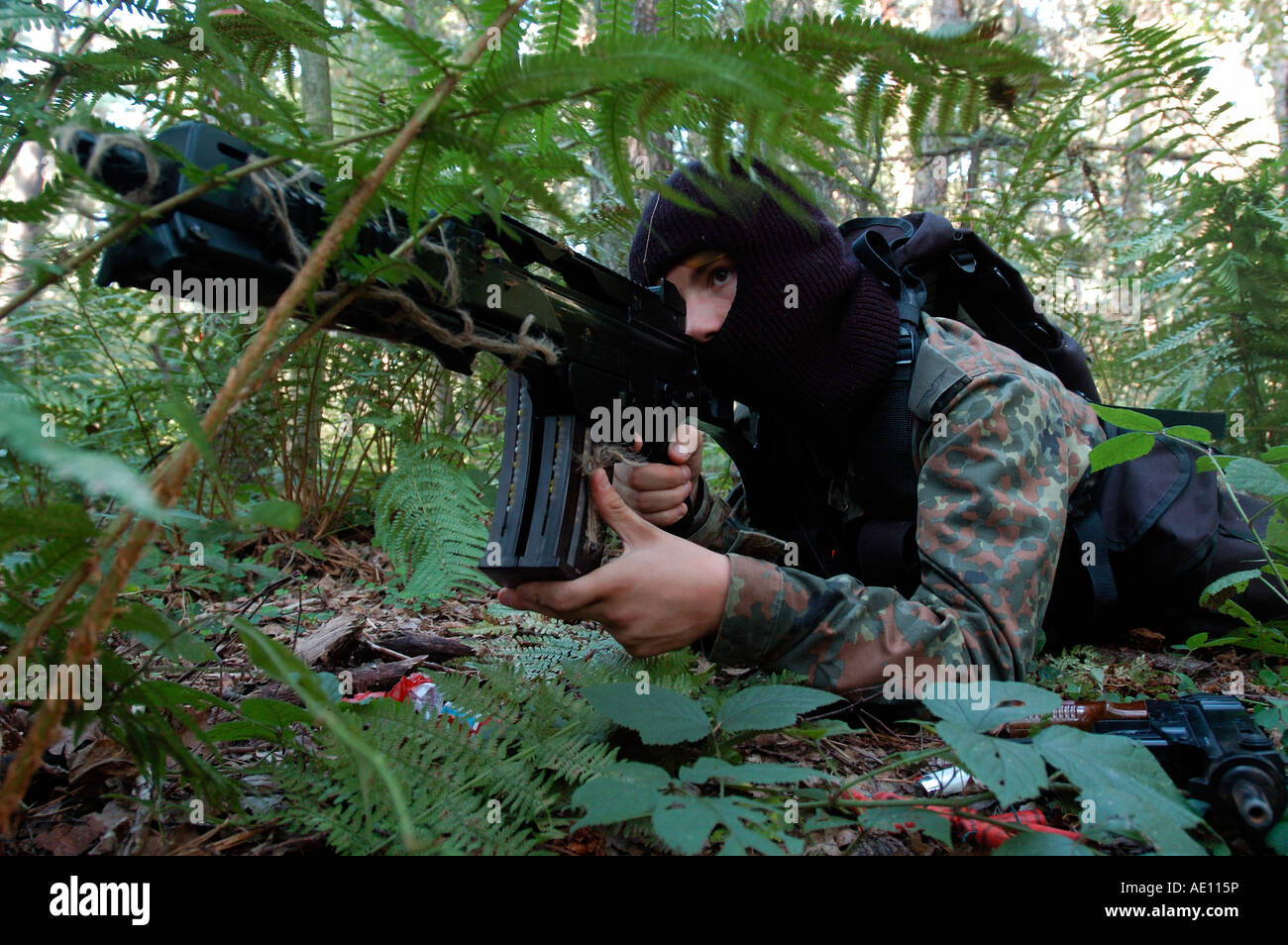 Man playing paintball Stock Photo - Alamy