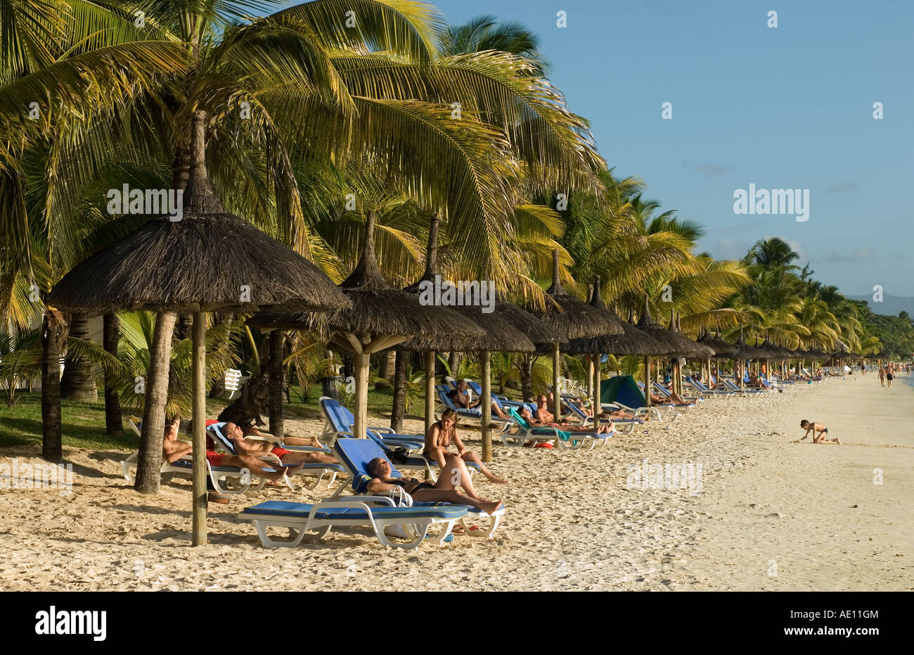 Mauritius island beach sunbathing hi-res stock photography and images ...