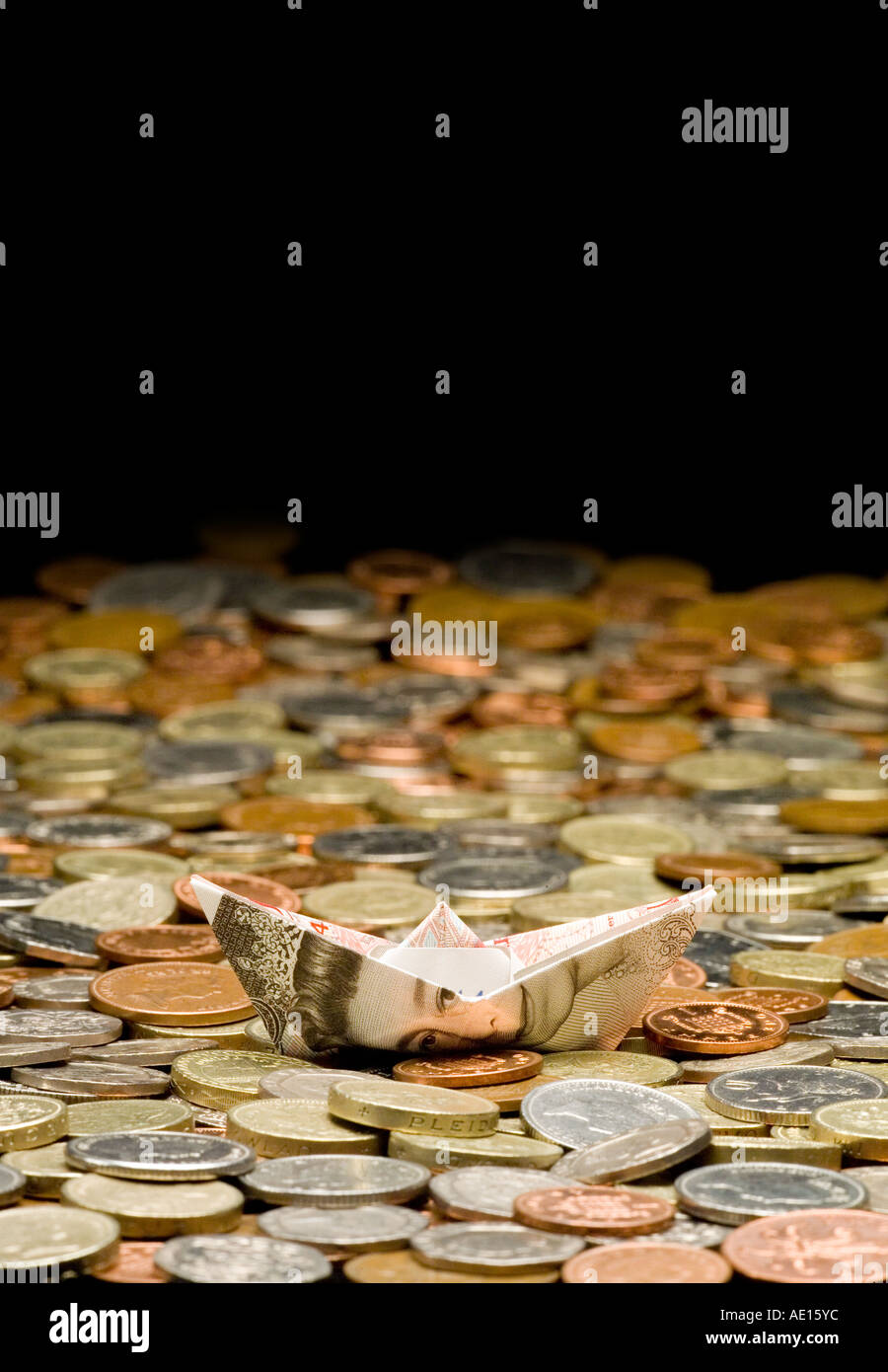 £50 50 pound note paper boat floating on a sea of English British UK ...