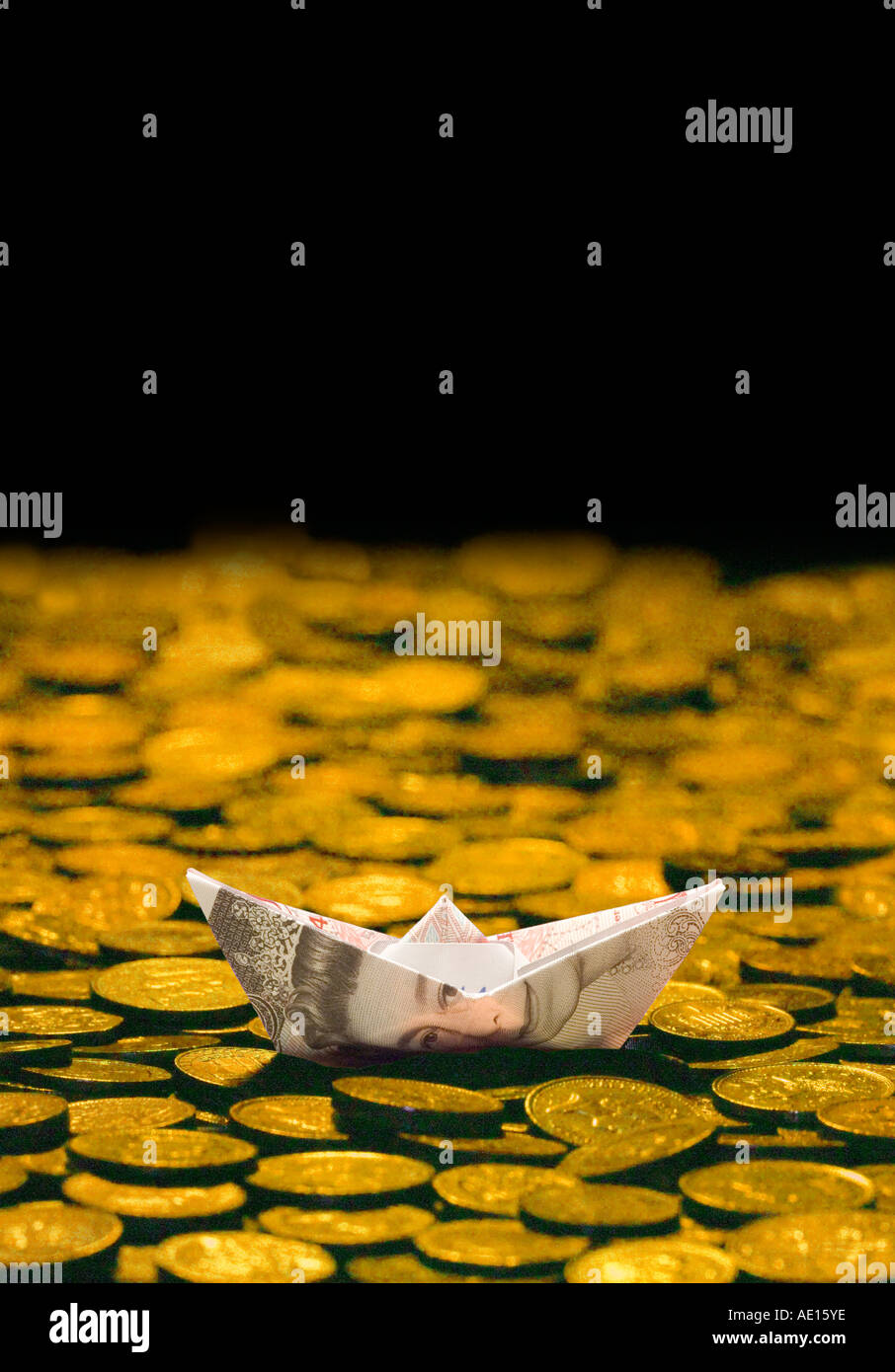 £50 50 pound note paper boat floating on sea of English British UK ...