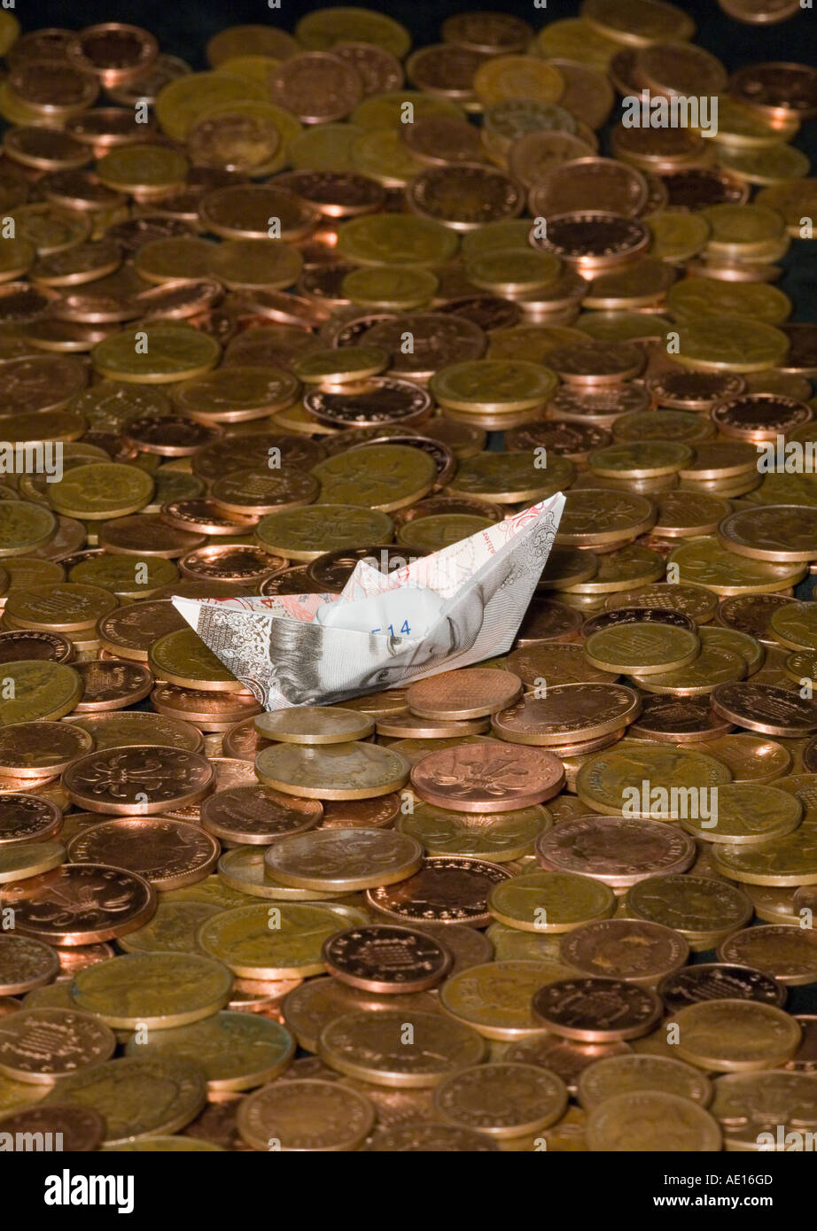 £50 50 pound note paper boat floating on a sea of English British UK ...