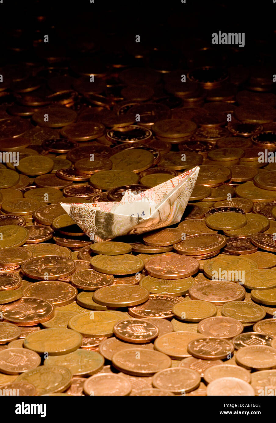 £50 50 pound note paper boat floating on a sea of English British UK ...