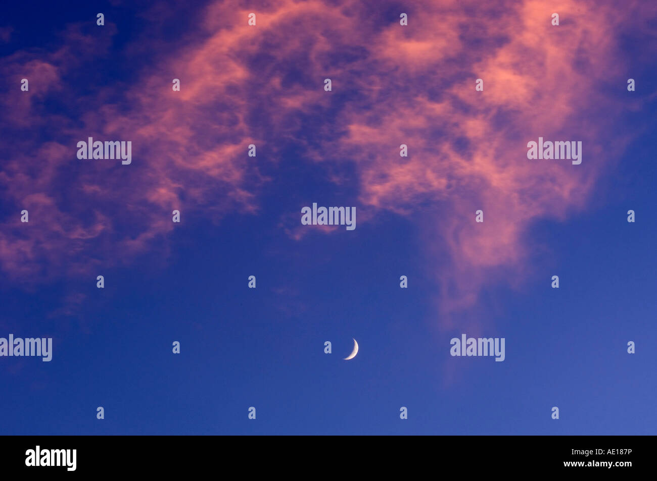 Crescent moon and clouds at sunset, Greater Sudbury, Ontario, Canada ...