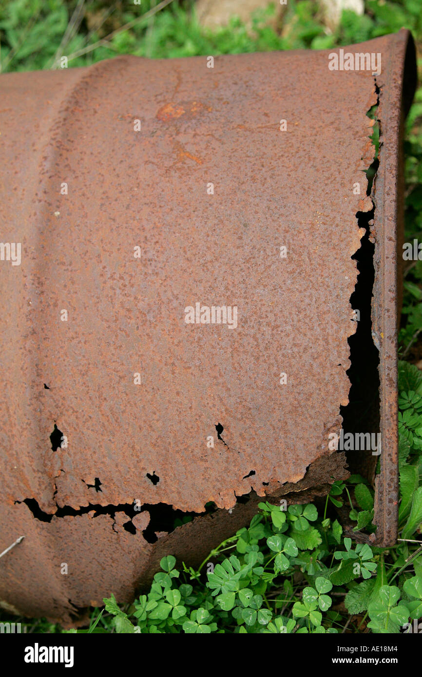rust close up environment colour day field green grass obsolete pile ...