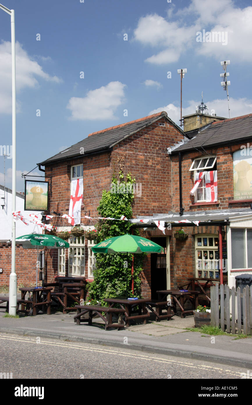 Pub decorated with flags and football signs Stock Photo - Alamy