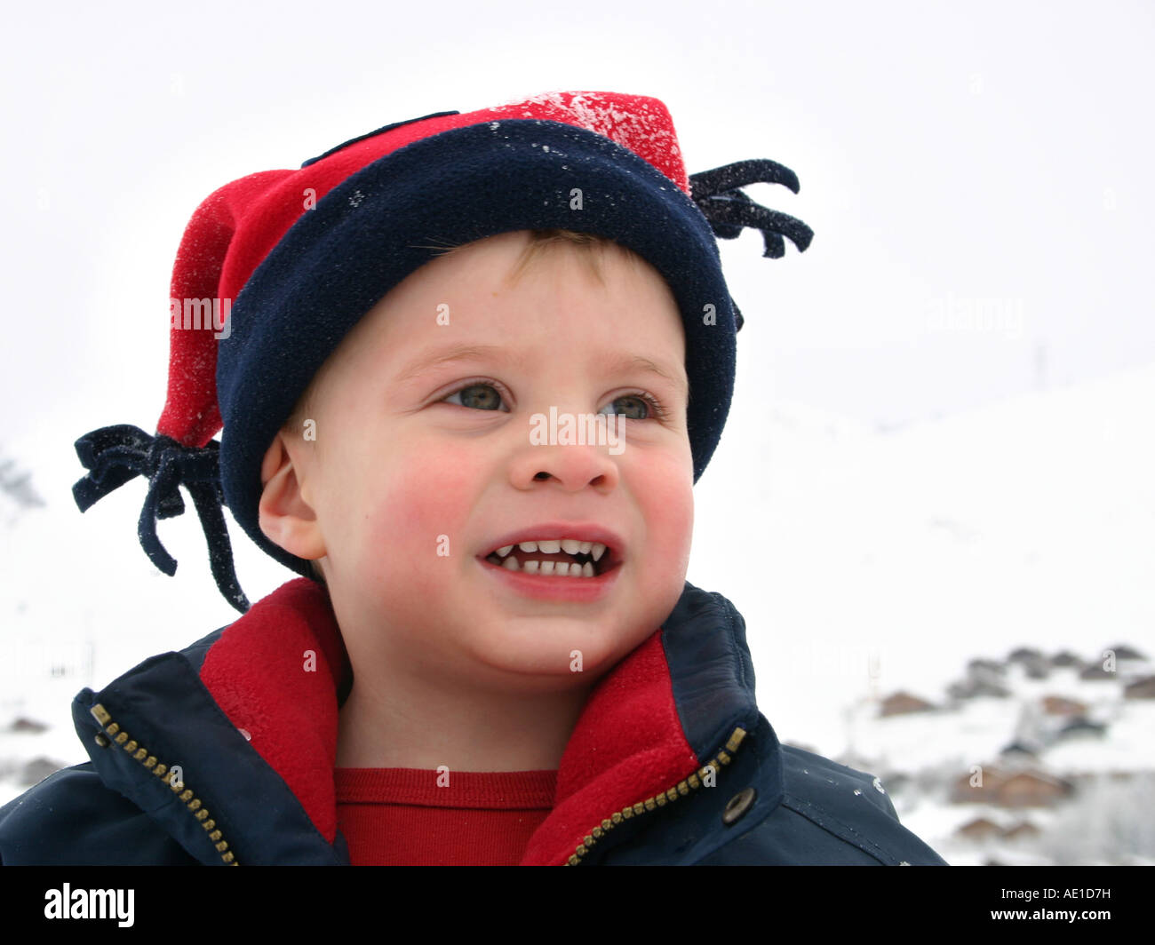 young boy looking at the mountains verbier switzerland Stock Photo - Alamy
