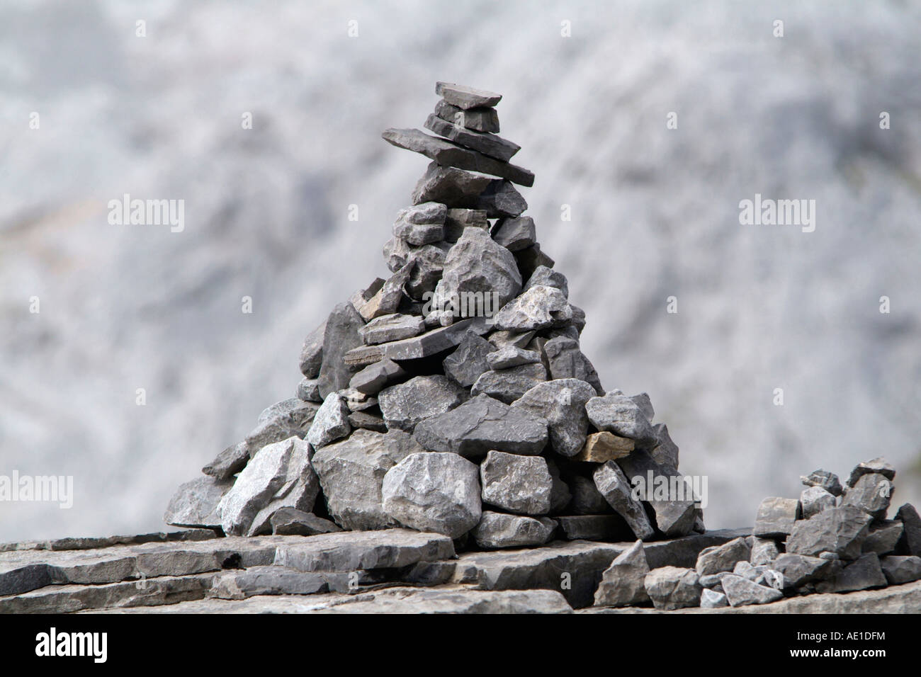 sign for mountaineering made of stones Stock Photo - Alamy