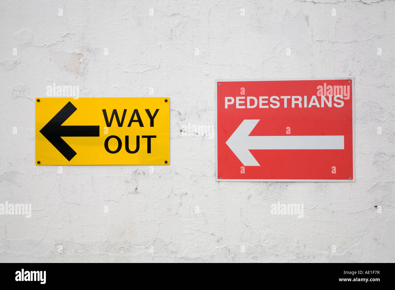 Pedestrian and Way Out Signposts Stock Photo - Alamy