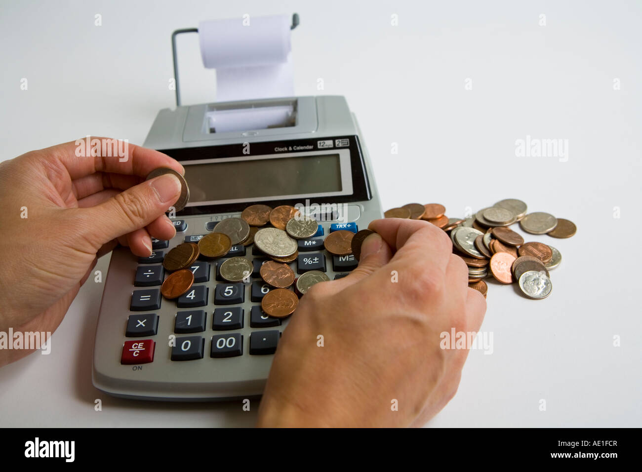 Counting Changes with Calculator Stock Photo - Alamy