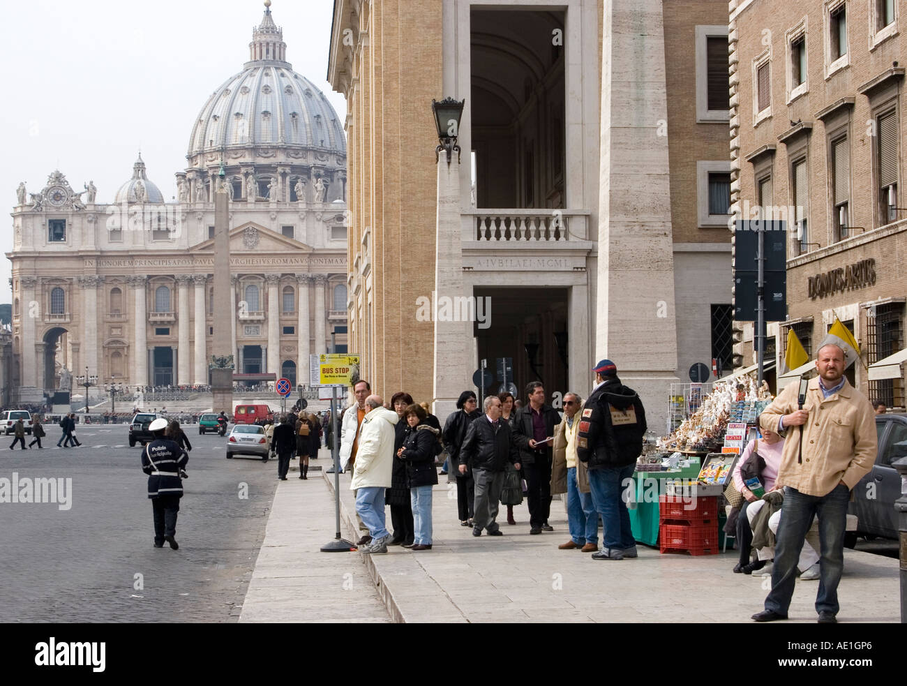People waiting at bus stop near Vatican and saint peters dome Rome ...