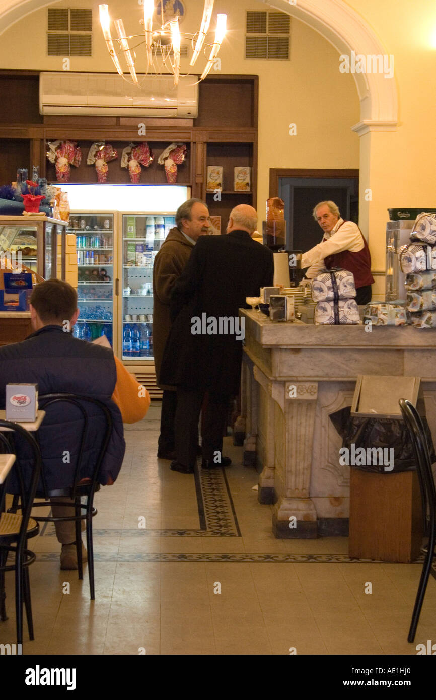 Men talking at a café in Rome Italy Stock Photo - Alamy