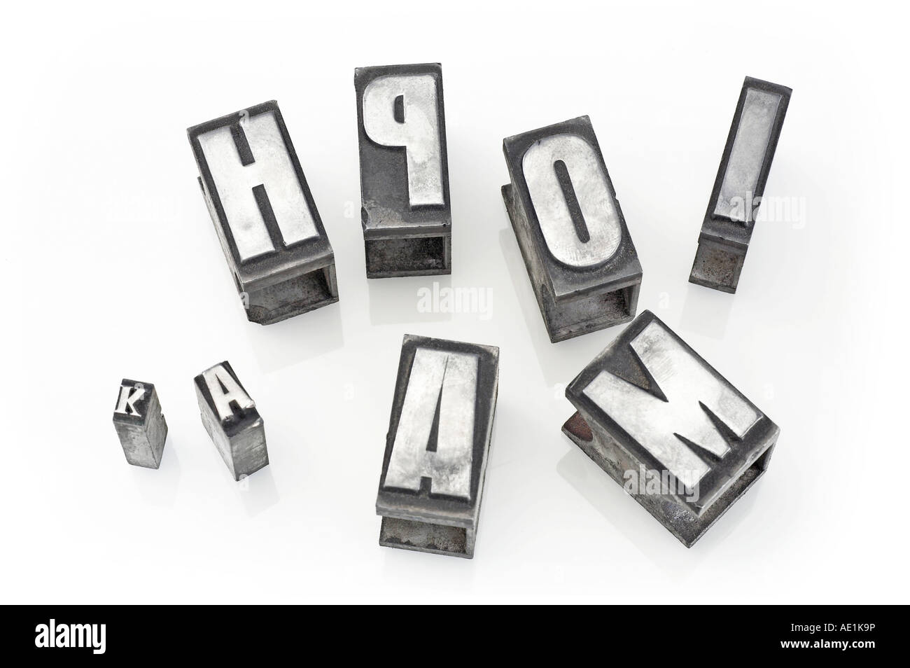 Lead letters on white background Stock Photo - Alamy