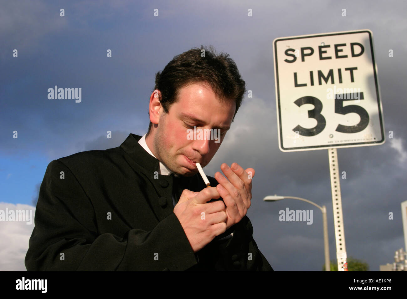 Boris Andrianov Russian cellist Lighting a Cigarette Stock Photo - Alamy