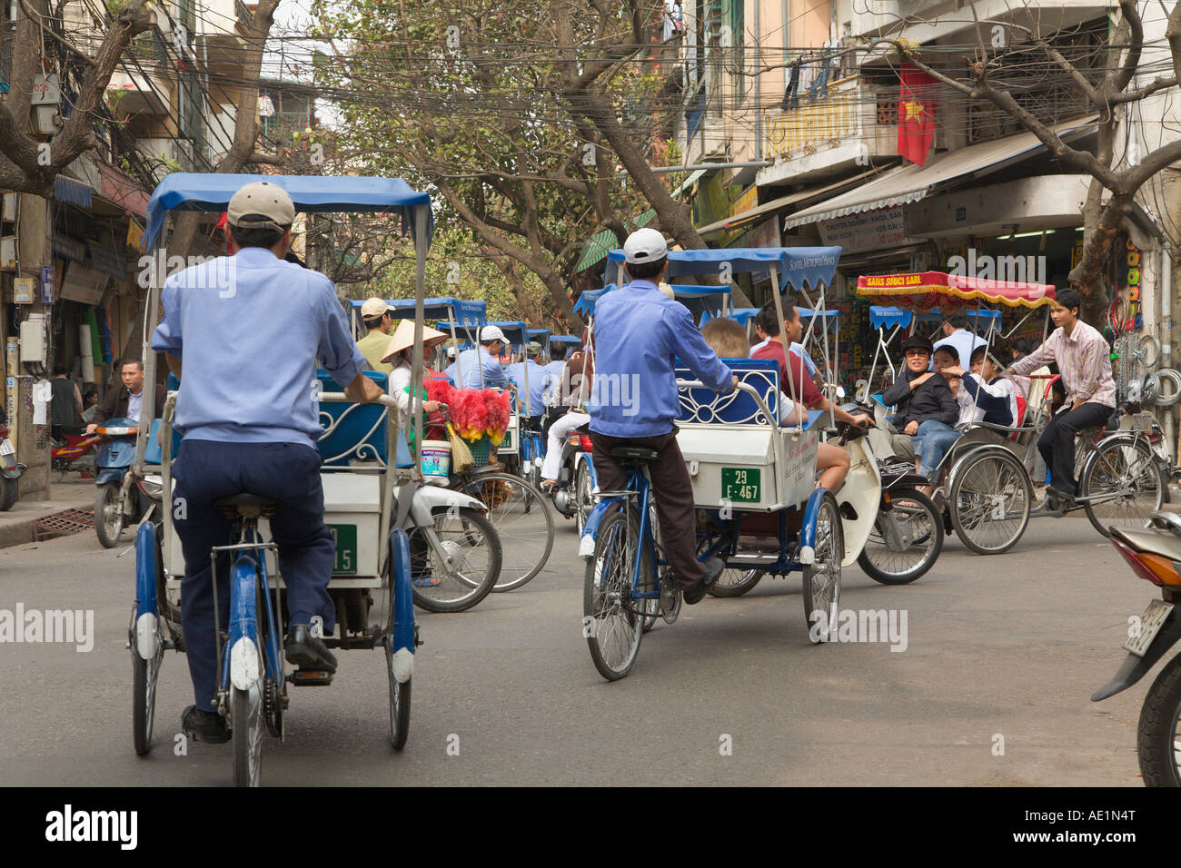 Tourists on a rickshaw ride Hanoi Vietnam Stock Photo - Alamy