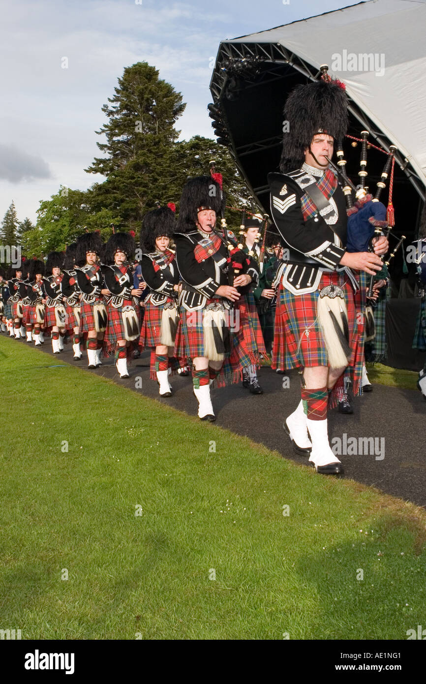 Performance of the Ballater Scottish Pipe marching musicians band with ...