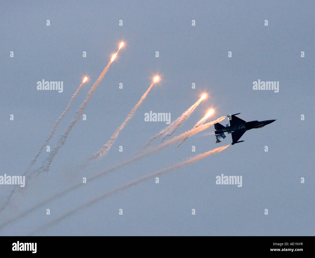 F16 Fighting Falcon Delta Wing Jet Fighter with afterburner with flares ...