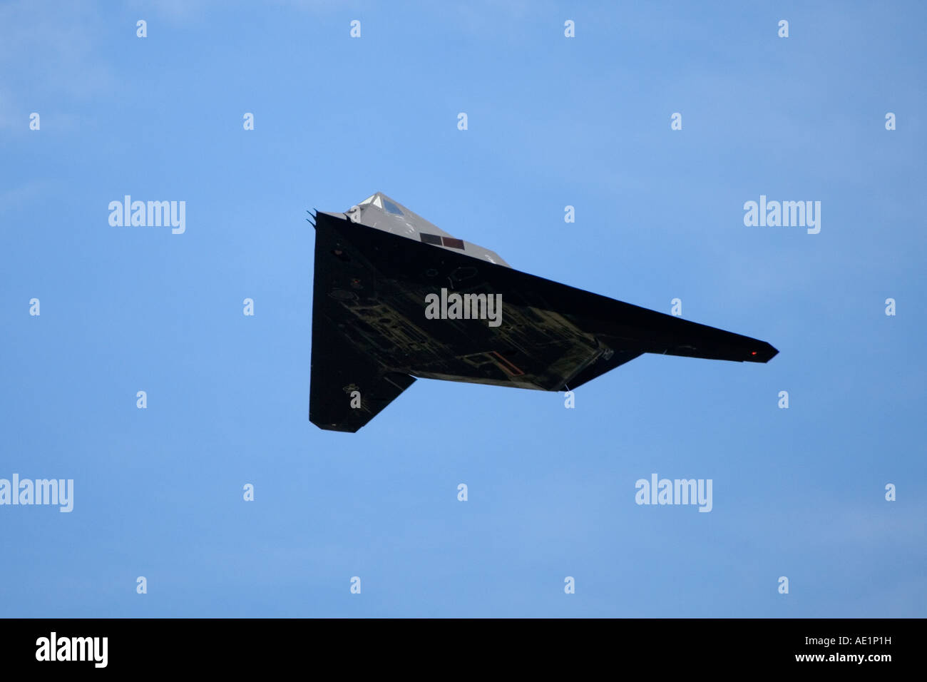 Lockheed F 117A Nighthawk Stealth fighter in blue sky Stock Photo - Alamy