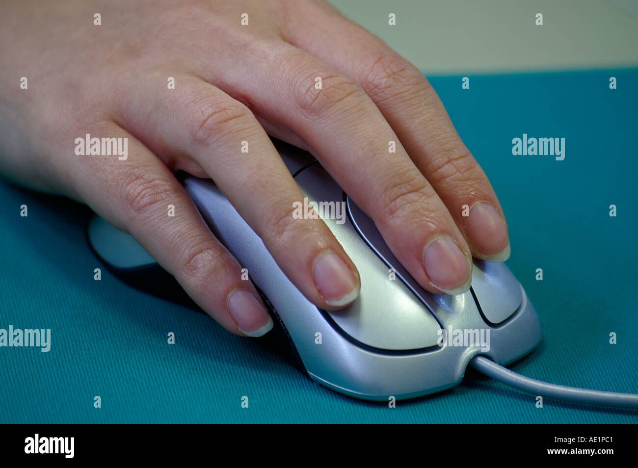 hand on computer mouse Stock Photo - Alamy