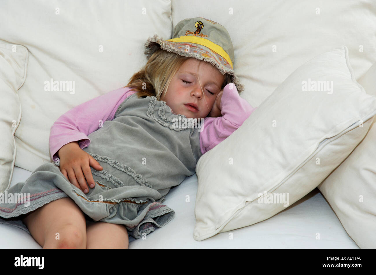 Little girl sleeping on the sofa Stock Photo - Alamy