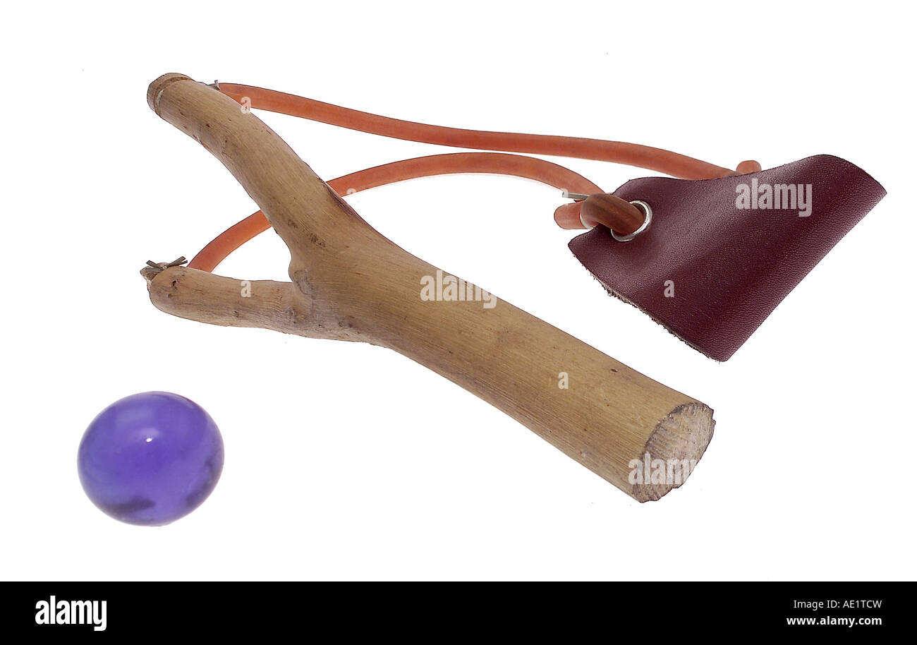 Still life of slingshot and marble Stock Photo - Alamy