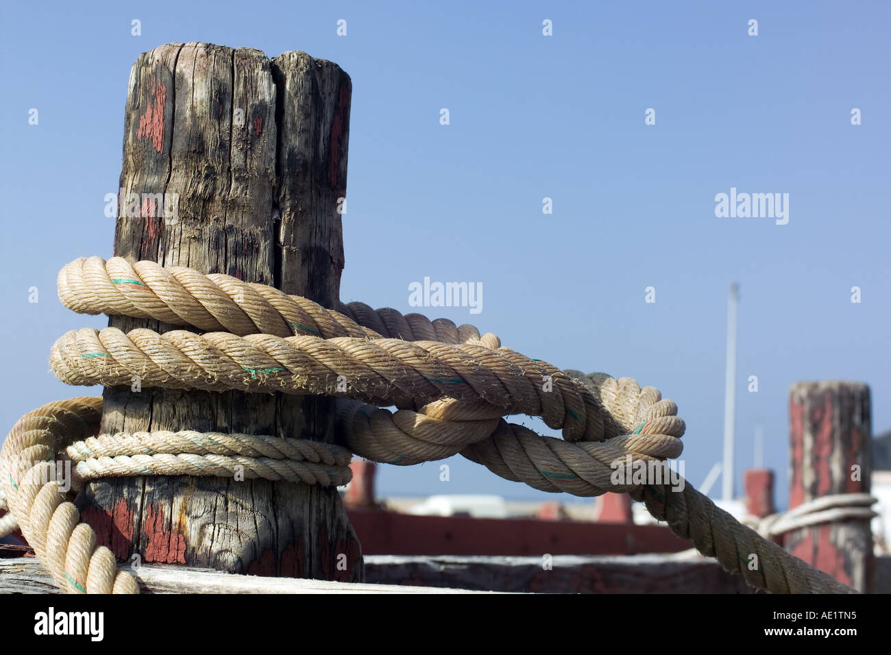 KNOT WITH BOAT ROPE AROUND MOORING POST ERQUY FISHING HARBOUR BRITTANY ...